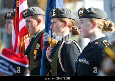 Members of the Spaulding High School Jr. ROTC give a 21-gun salute ...