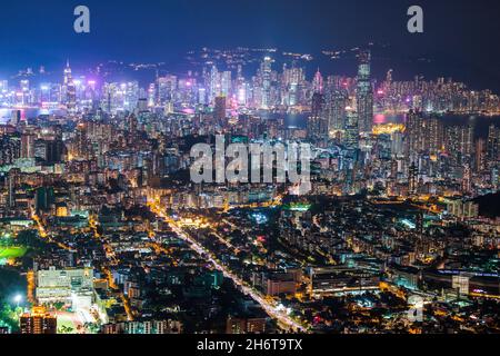 Nightscape of the Victoria Harbour and Kowloon area of Hong Kong. cyberpunk color tone Stock ...