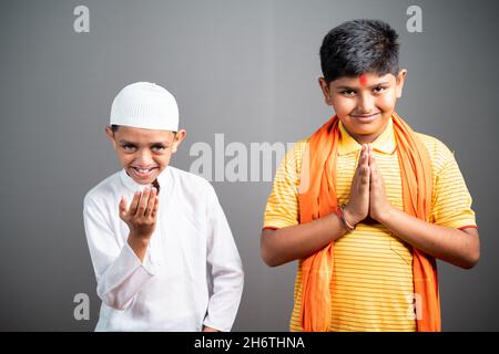 Happy Hindu muslim multiethnic kids by playing by clapping hands ...