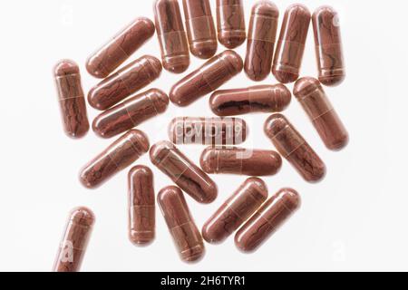 covid-19 recovery pills on black background Stock Photo - Alamy