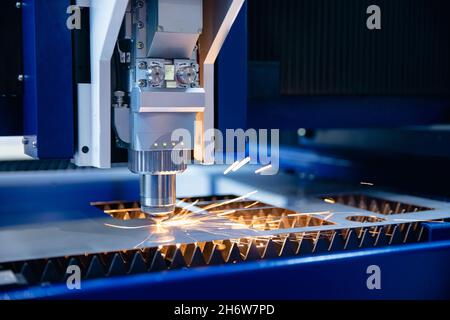 Macro photo cutting of metal CNC Laser engraving. Concept background ...