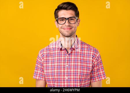 Photo of smart clever young positive man dressed yellow shirt in ...
