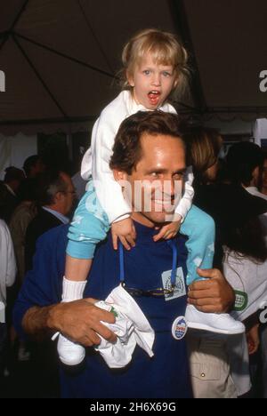 Gregory Harrison and daughter Emma Harrison attend the 1990 Permanent ...