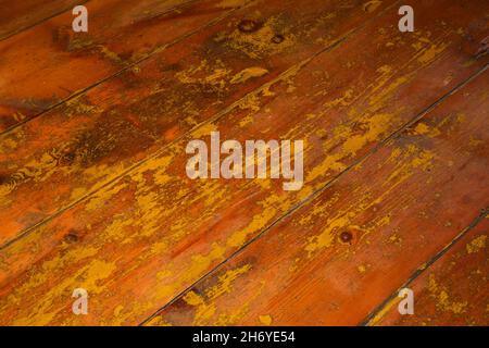 Distressed pine wood floorboards on upstairs floor hallway inside an ...