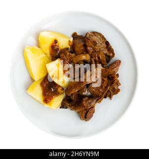 Fried rabbit liver served with boiled potato Stock Photo - Alamy