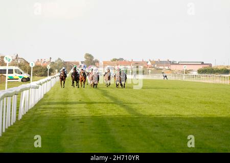Documenting the atmosphere and thrill of a day at the races with the ...