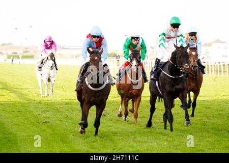 Documenting the atmosphere and thrill of a day at the races with the ...