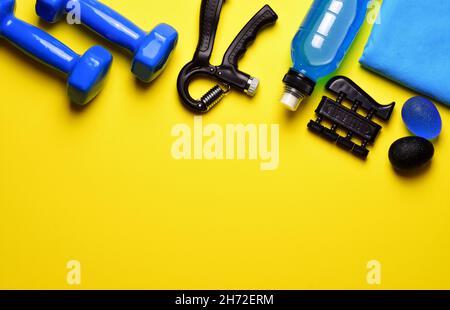 Pair of dumbbells, top view. Hand weights on wooden background ...