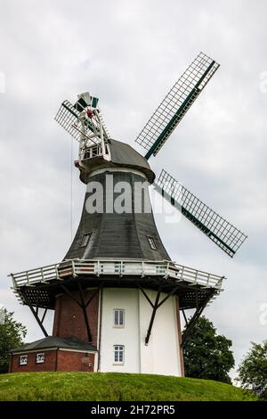 Big windmill nearby the canal and a cloudy sky Stock Photo - Alamy