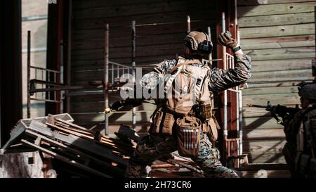 U.S. Marine Corps Cpl. Alex Carrillo Orantes, an engineer equipment ...