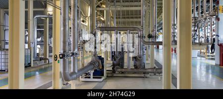 Panoramic photo of pipes and tanks. Chemistry and medicine production ...