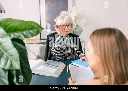 job office interview by senior stylish woman. Business, communication ...