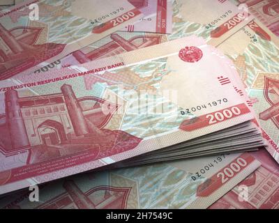 3D illustration of Uzbekistani som bills stacks background Stock Photo ...