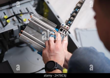 Male hand is holding a cpu, close up; Computer technology Stock Photo ...