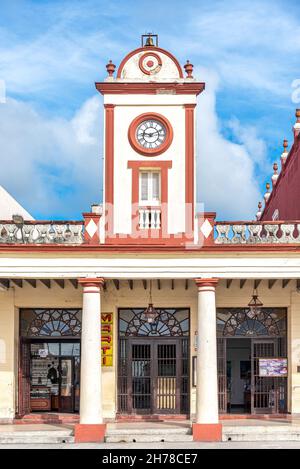 Clock tower building of Artex, Holguin, Cuba Stock Photo - Alamy