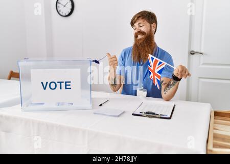 Caucasian man with long beard at political campaign election holding ...