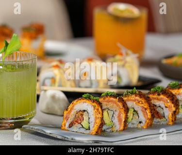 Assorted japanese sushi ans sashimi on a table Stock Photo - Alamy