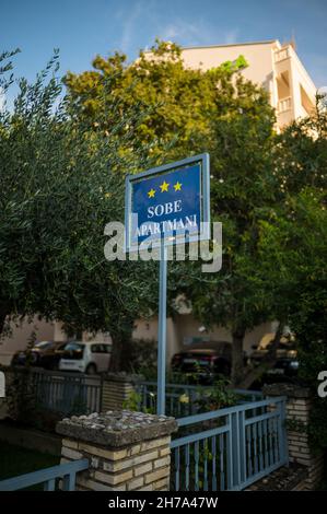 A Croatian sign for rooms surrounded by trees Stock Photo - Alamy