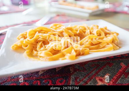 A plate with traditional Armenian noodles Arishta. National folk ...