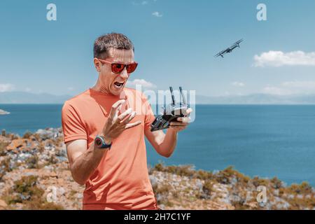 the fall of the drone. a broken flying quadcopter is lying on the ...