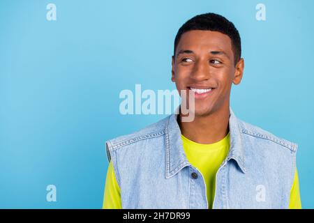 Photo of minded young cool man hold hand chin look empty space think ...