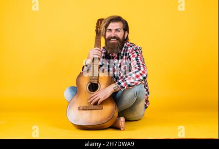 Rugged and manly. happy musician guitarist. charismatic mature man ...