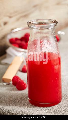 Homemade raspberry liqueur Stock Photo - Alamy