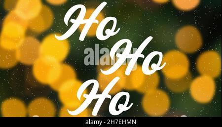 Image of ho ho ho text over snow falling on green background at ...