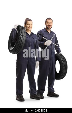 Female auto mechanic with lug wrench on white background Stock Photo ...