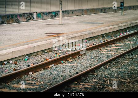 Spray cans near railroad tracks Stock Photo - Alamy