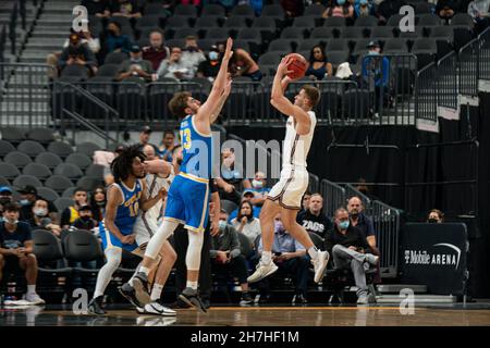 UCLA guard Jake Kyman shoots against Washington during the first half ...