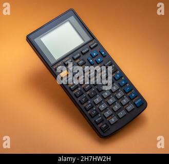 A studio photo of an electronic business calculator Stock Photo - Alamy