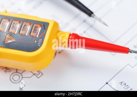 Voltage tester on electrical diagram Stock Photo - Alamy