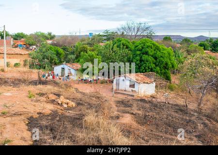 Poorly made houses with broken ceramic roof tiles in a settlement by ...