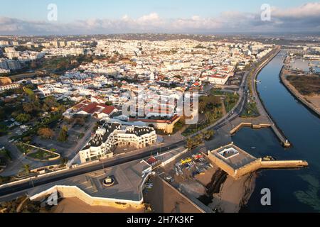 Aerial from the city Lagos in the Algarve Portugal at sunrise marina ...
