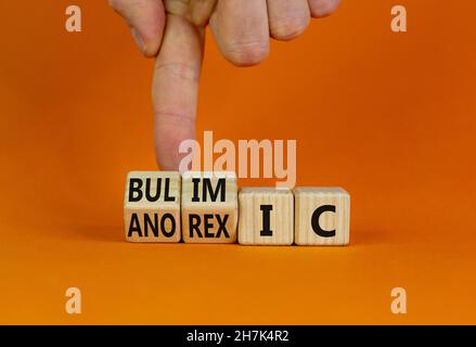 Bulimic or anorexic symbol. Doctor turns wooden cubes and changes the ...