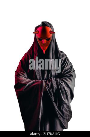Isolated scary horror occult sectarian priest in black hood and metal ...