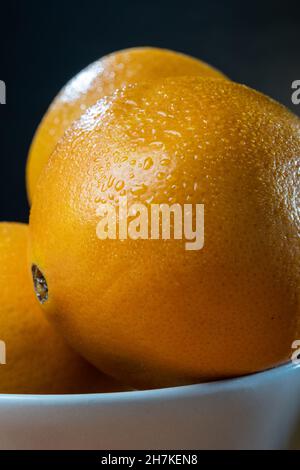 Helsinki / Finland - Closeup of moist oranges and glass bottle of ...