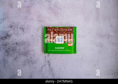 Kiev Ukraine - October 2021 CASHEW taste. Nut selection Chocolate ...