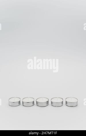 pure wax scented tea lights on a white background with space for text ...