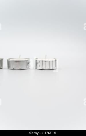 pure wax scented tea lights on a white background with space for text ...