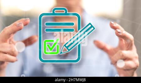 Document validation concept between hands of a woman in background ...