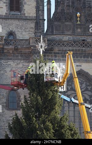 Specialists decorate Prague Christmas tree on the Old Town Square in ...