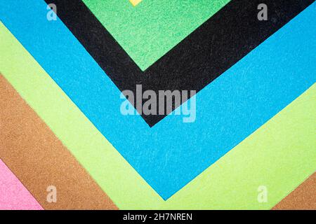 Multicolor background from a paper of different colors. Abstract ...