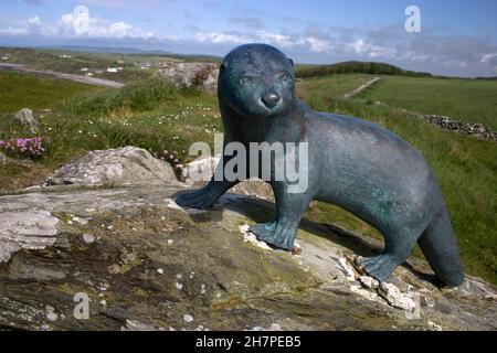 Gavin Maxwell memorial, a bronze otter on rocks at Monreith in Dumfries ...