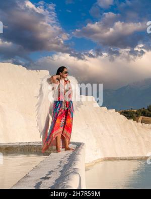 Pamukkale, Denizli, Turkey - August 26 2021: Tourists walking barefoot ...