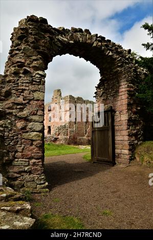 A view of the ruins of Norham Castle, a medieval building in ...