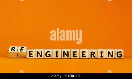 Engineering or reengineering symbol. Turned cubes and changed words ...