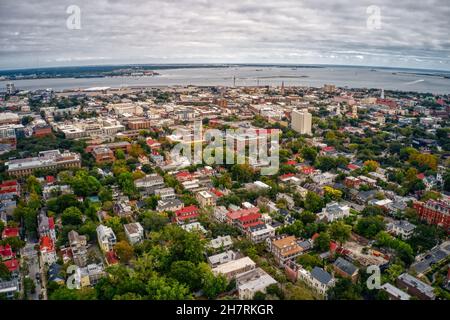 Beautiful aerial view of Charleston with dense buildings under a cloudy ...