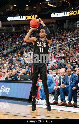 Gonzaga guard Nolan Hickman (11) controls the ball during the second ...